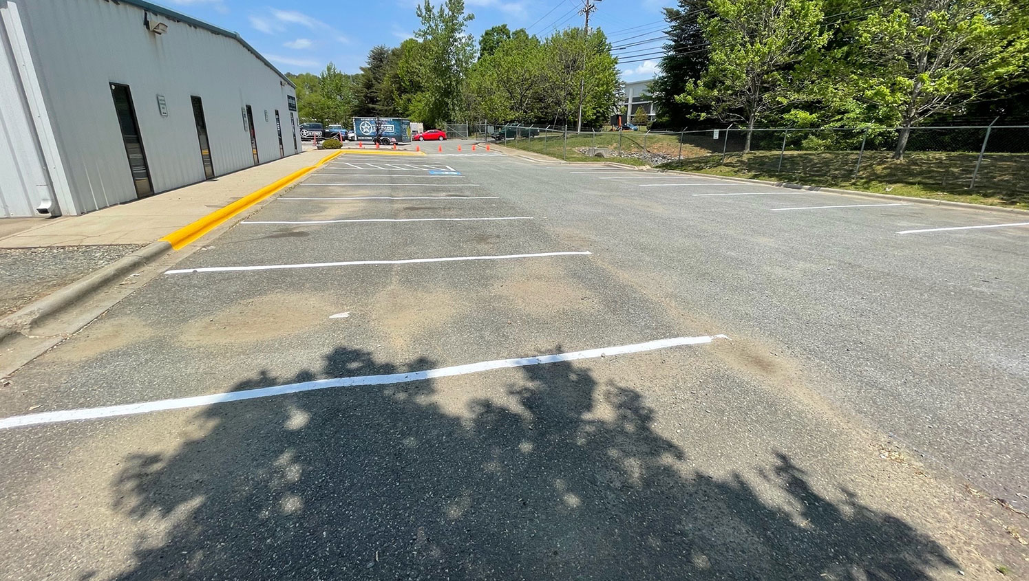 Charlotte Mobile Mini Restriping and Curb Painting Project | View Photos