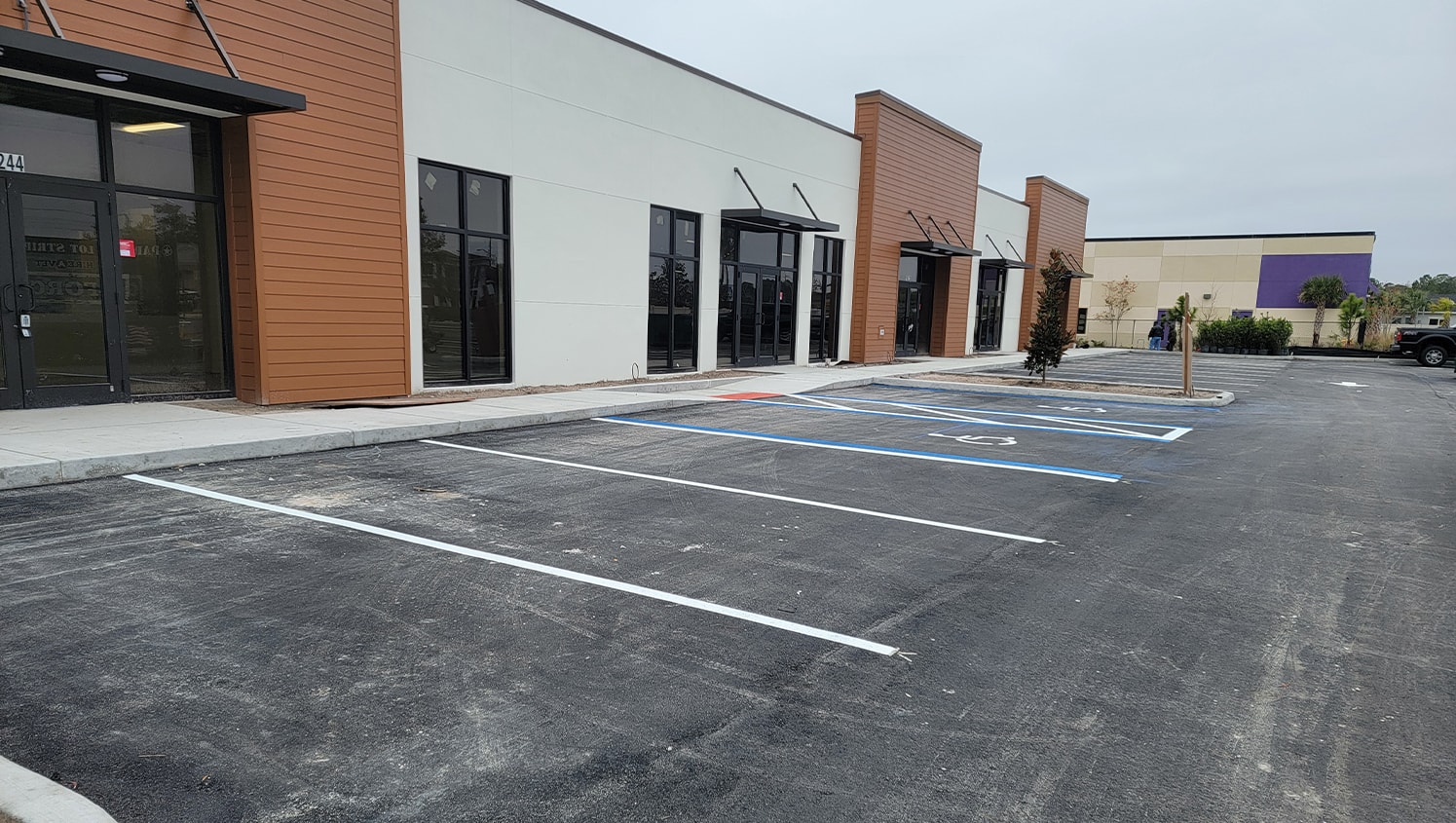 Line Striping Project for a Strip Mall in Odessa | G-FORCE®